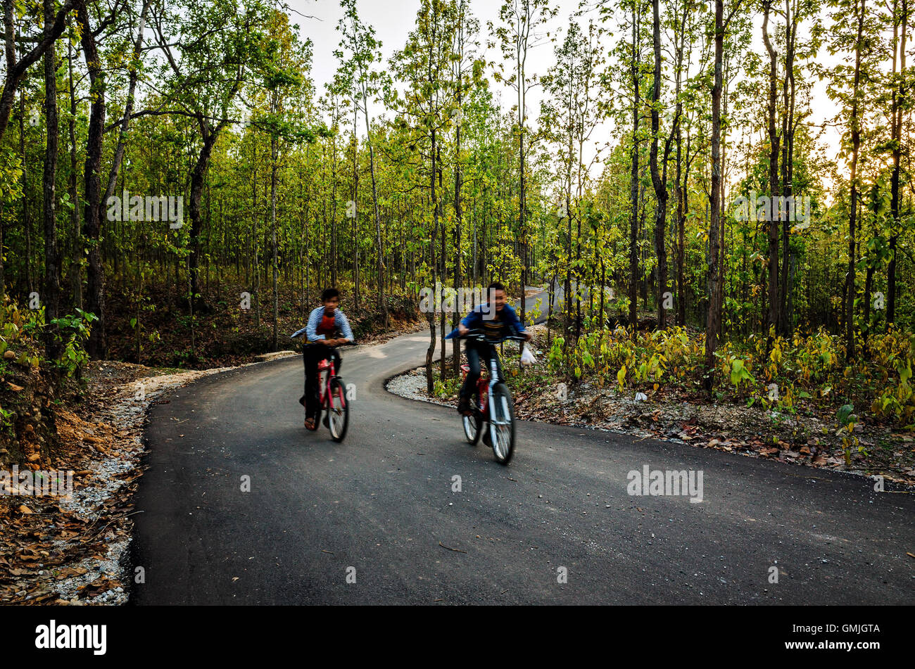 two childhood friends on a bicycle adventure Stock Photo - Alamy