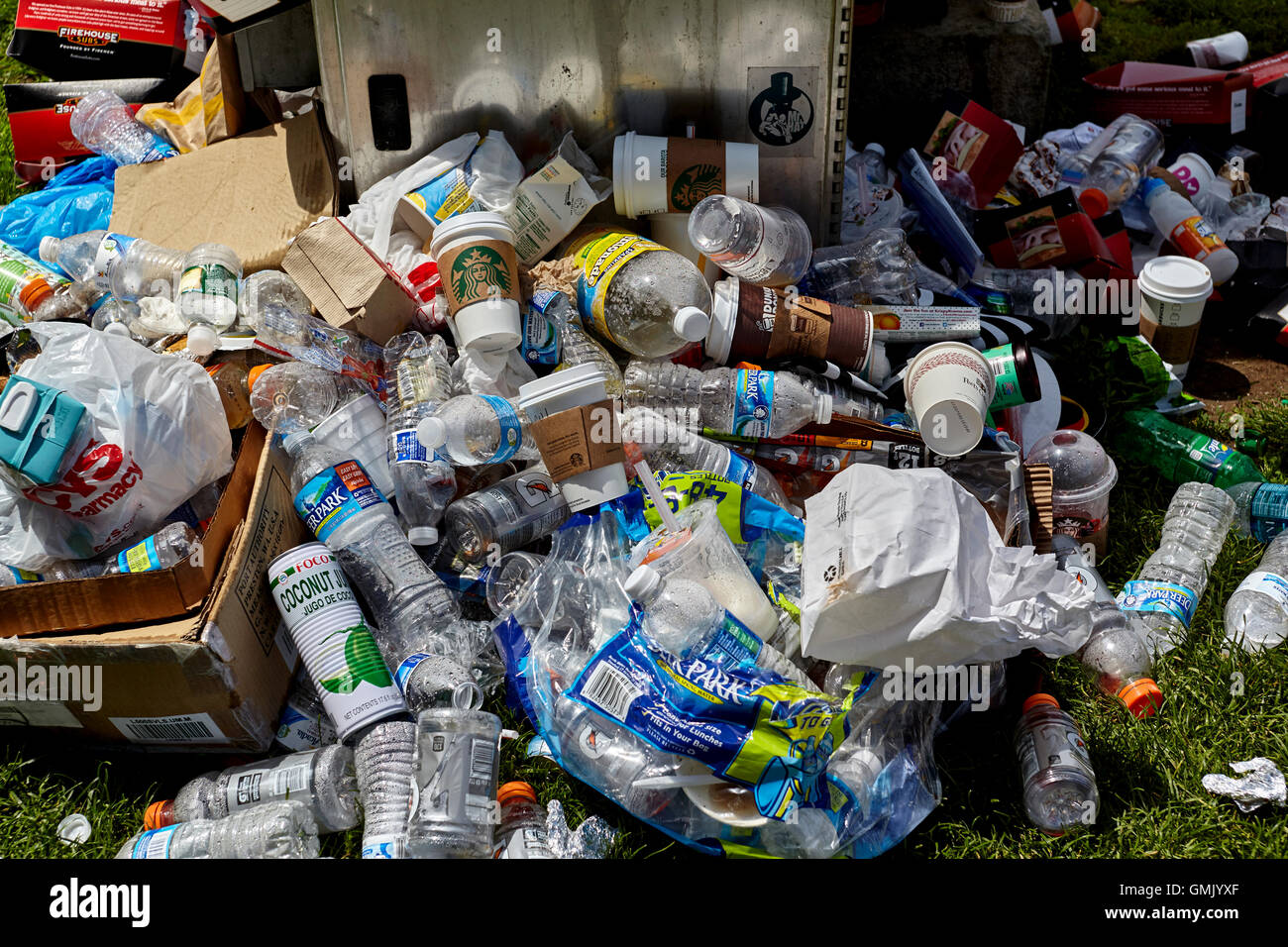 Trash overflow on the ground next to rubbish can in Presidents park ...