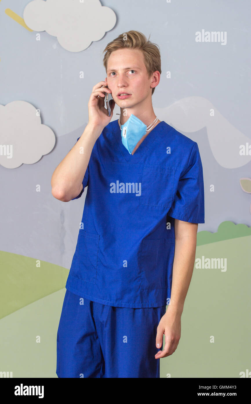 Modern medical professional using smart phone indoors Stock Photo - Alamy