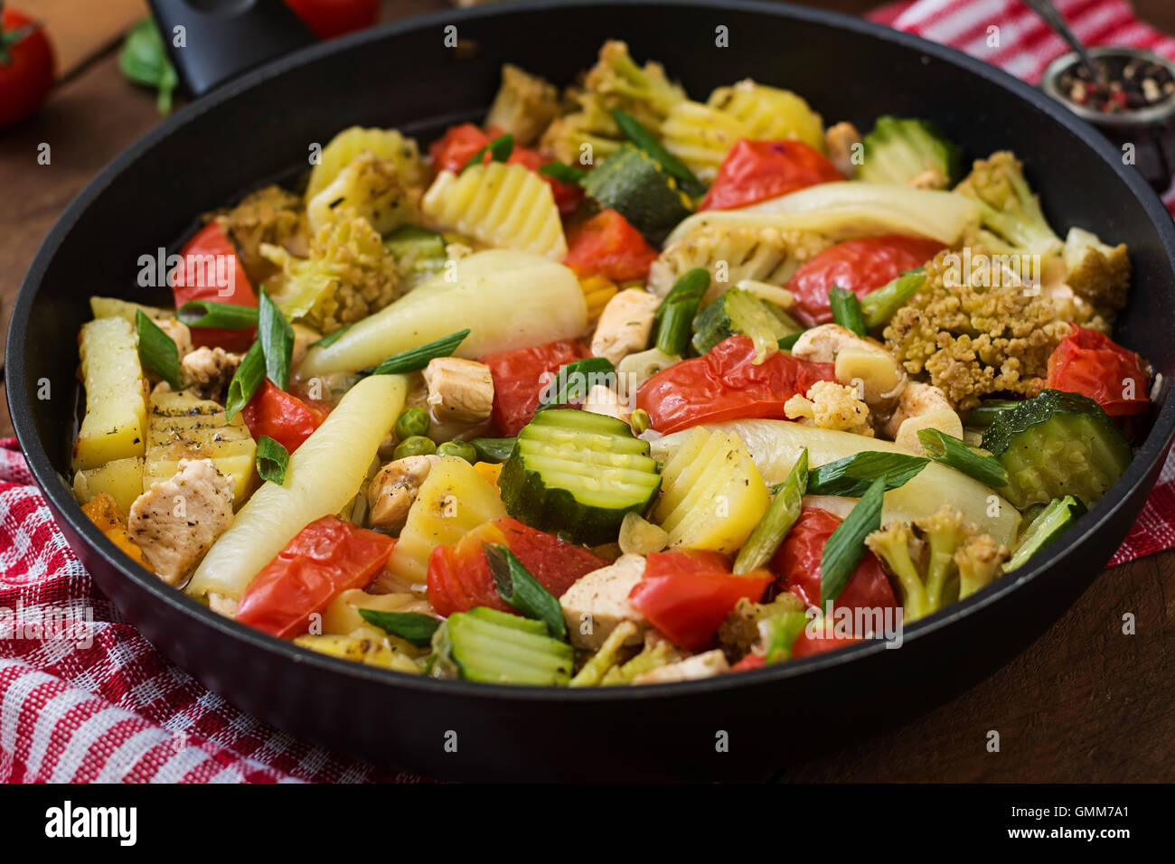 Dietary menu. Steamed vegetables with chicken fillet in pan on the ...
