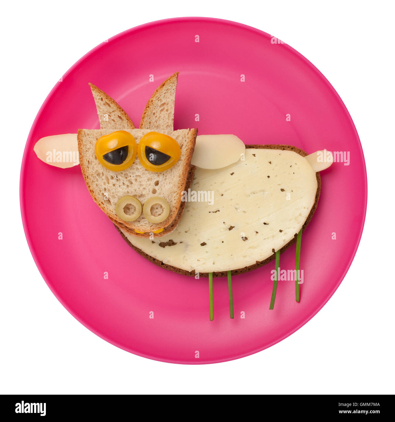Goat made of bread and cheese on plate Stock Photo - Alamy