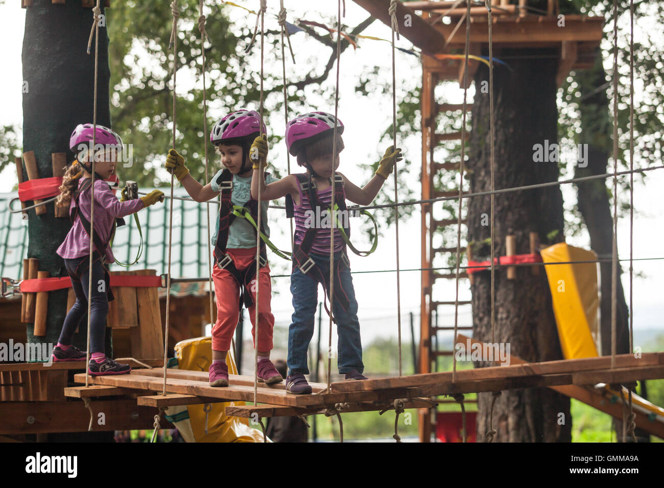 The obstacle course in adventure park Stock Photo - Alamy
