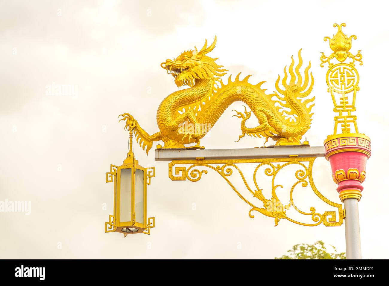 Gold chinese dragon on street lamp lighting Stock Photo - Alamy