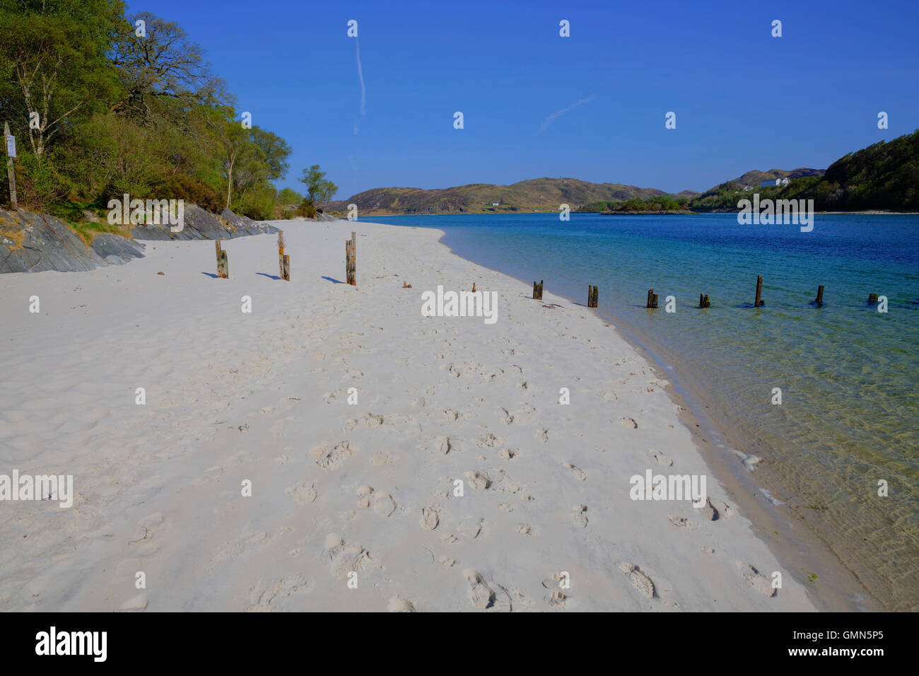 Beautiful white sandy beach in the uk at Morar Scotland with turquoise ...