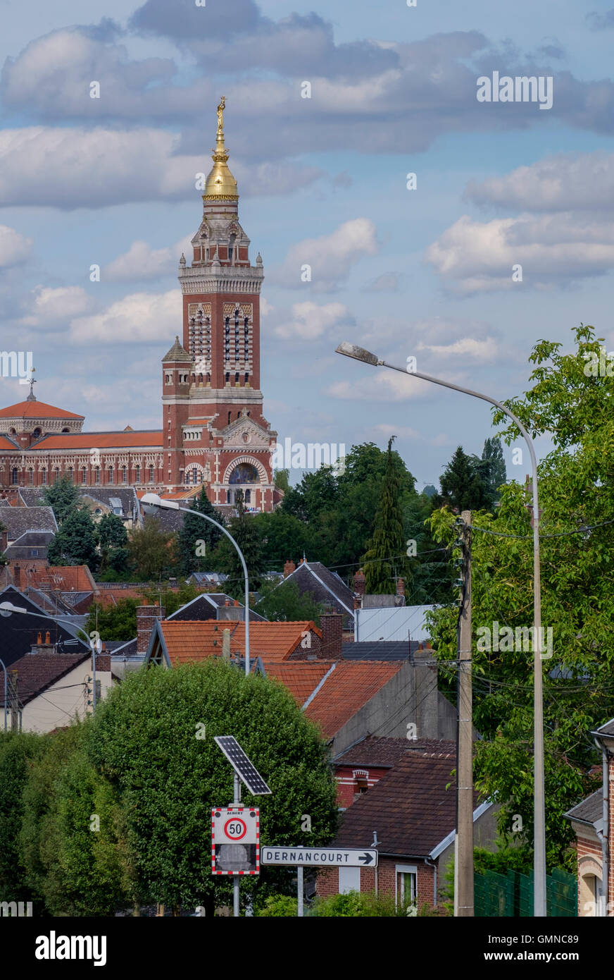 The Golden Virgin on top of the Basilica, Albert, dominates the town ...