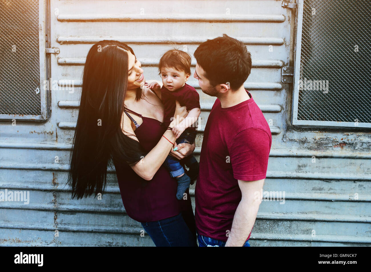 young family with a child Stock Photo - Alamy