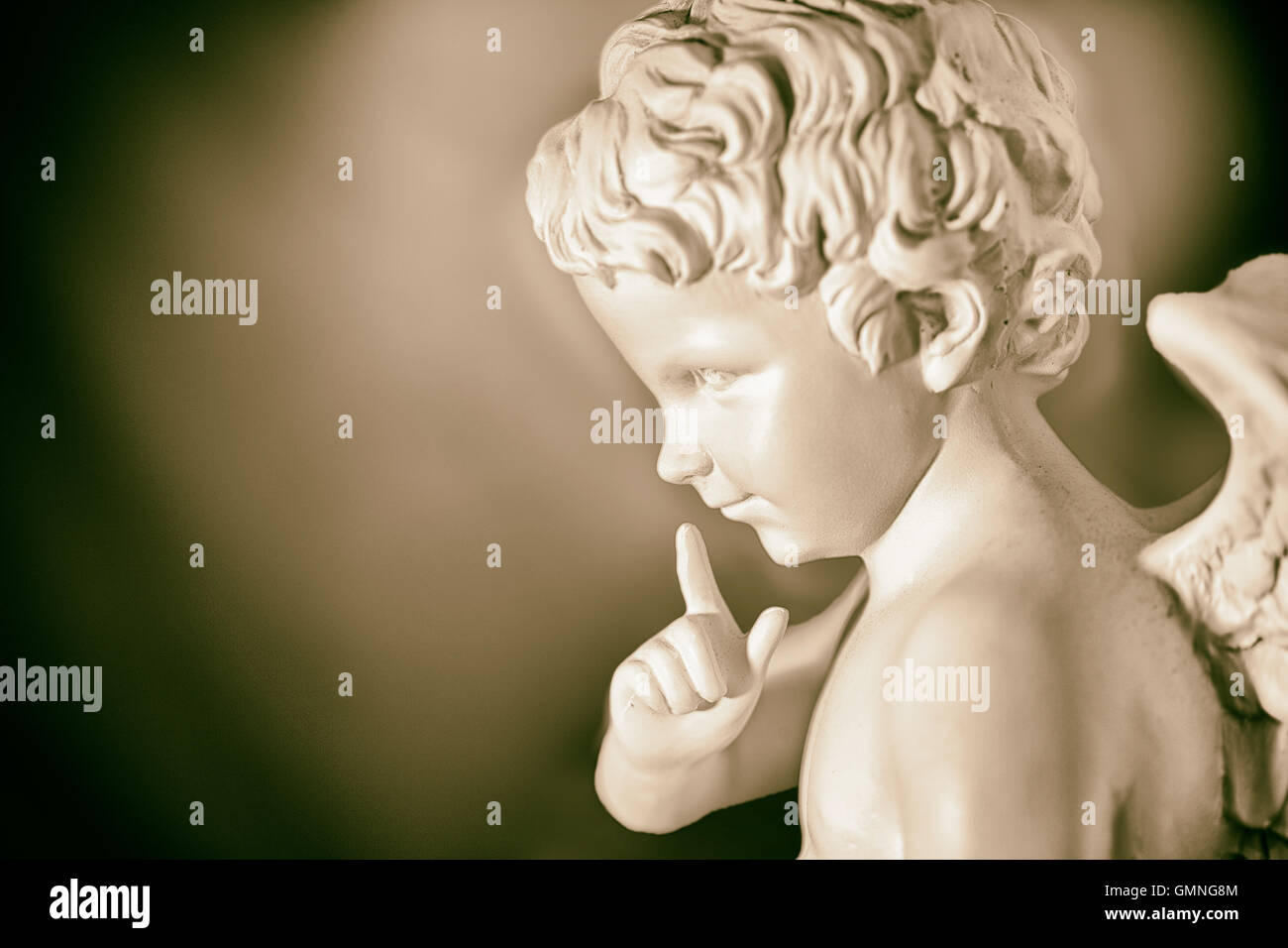 Sitting cupid hi-res stock photography and images - Alamy