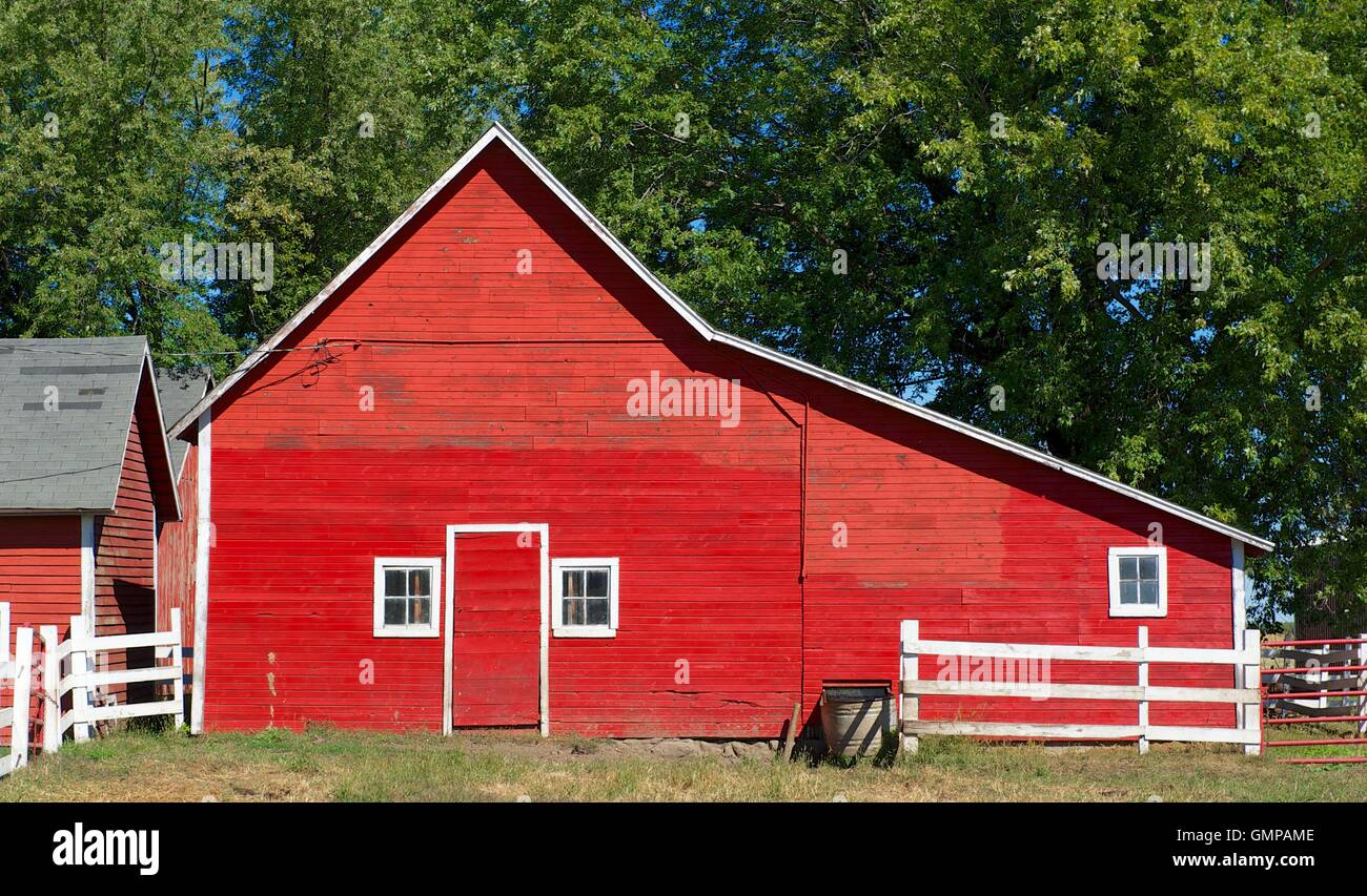 Red Wisconsin Barn With Door and Three Windows Stock Photo - Alamy
