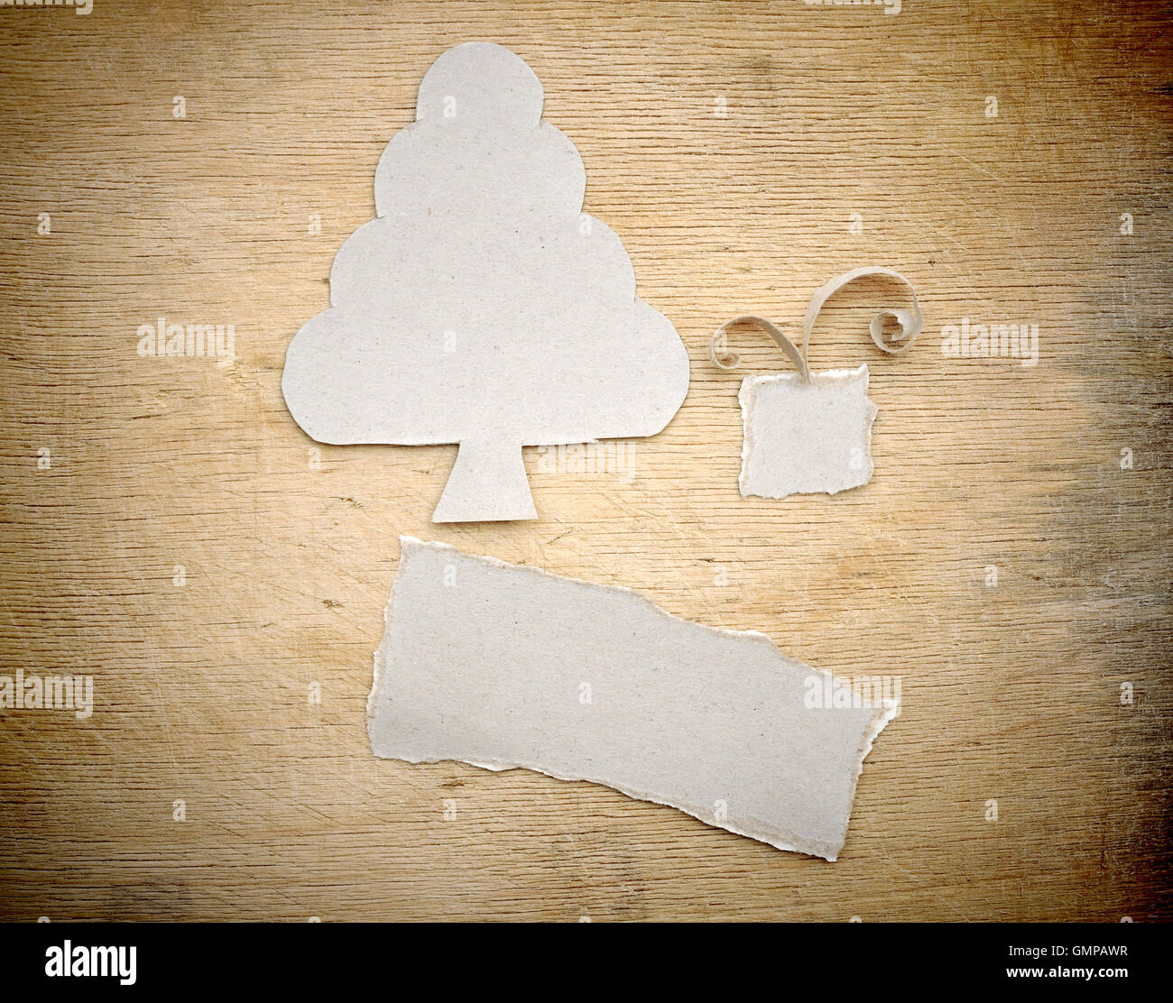 christmas tree made of torn paper on old wood background Stock Photo ...