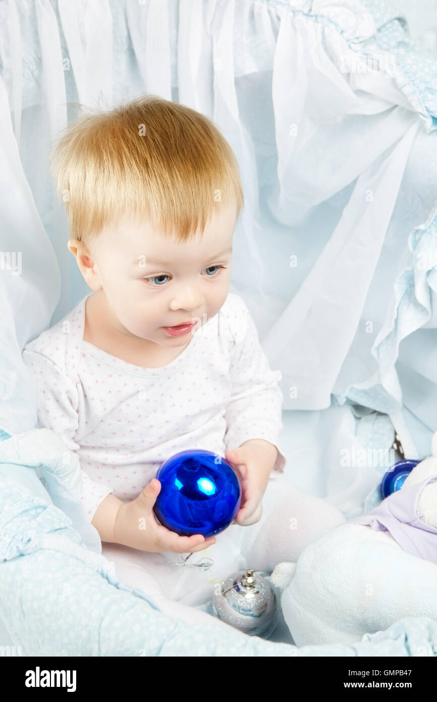 Child in Cradle Stock Photo - Alamy