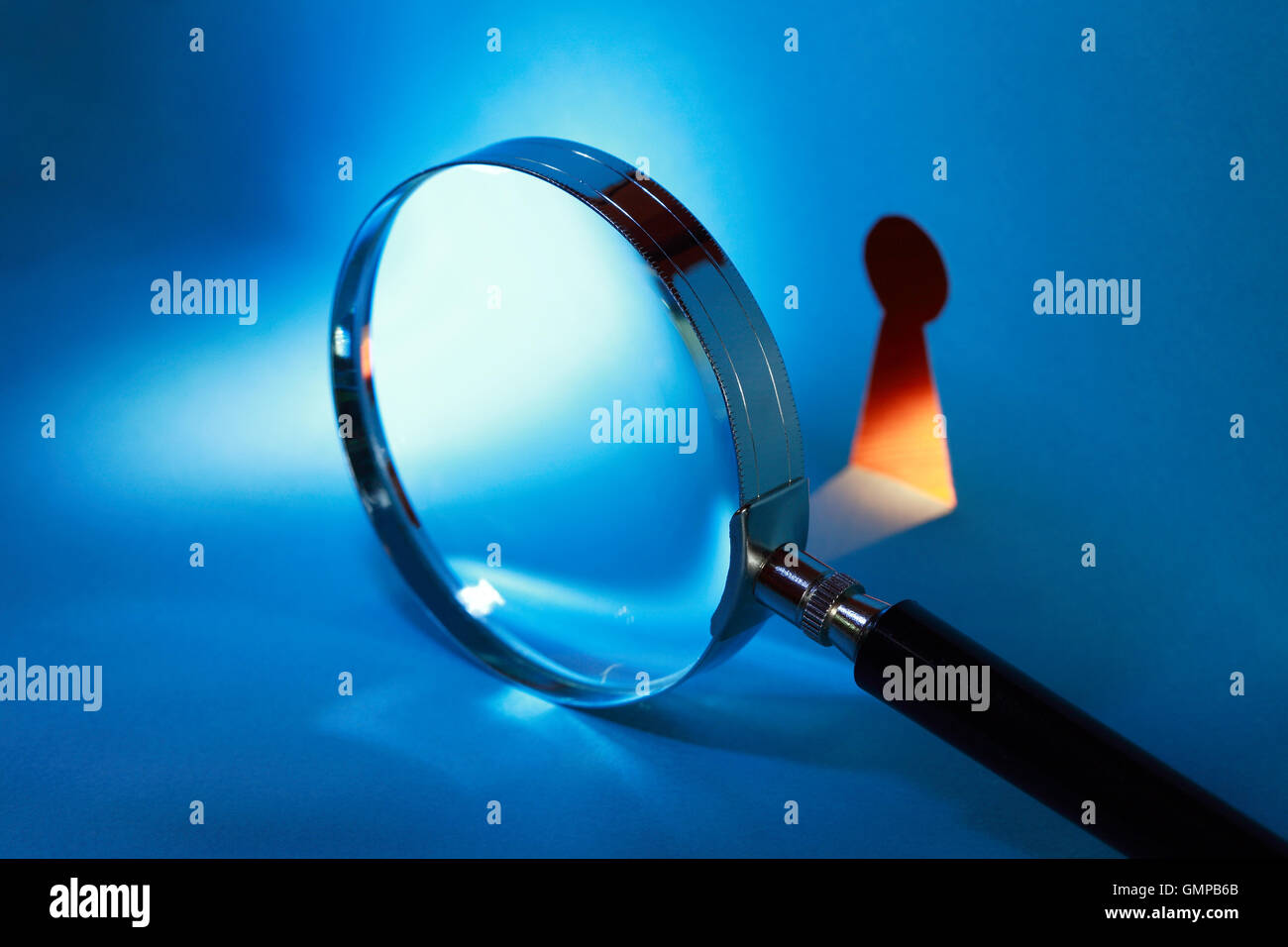 Magnifying Glass And Keyhole Stock Photo - Alamy