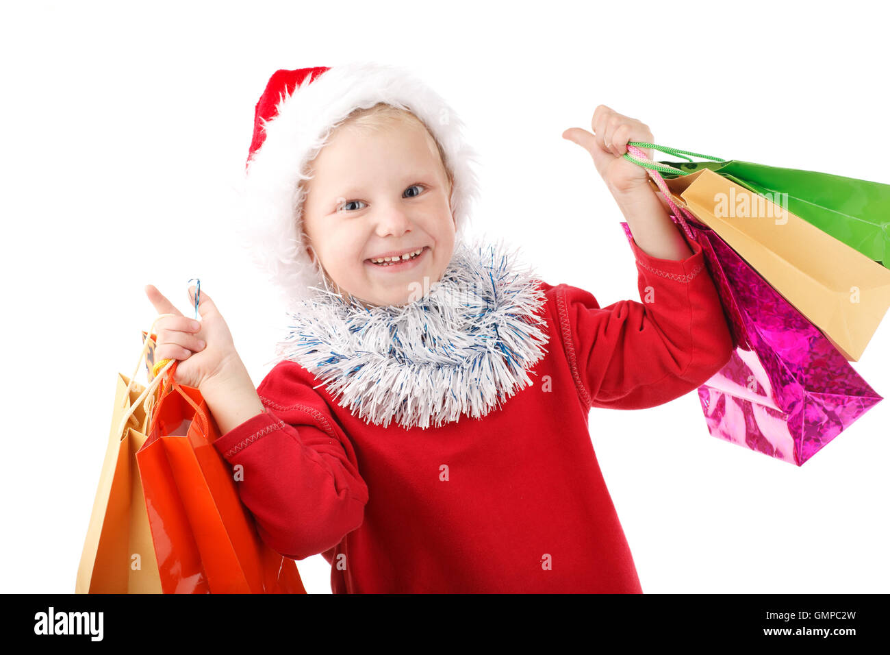 Small Santa with presents Stock Photo - Alamy
