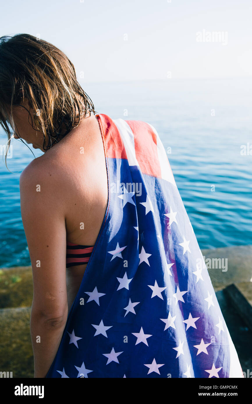 Back view of wet-haired woman in american flag Stock Photo - Alamy