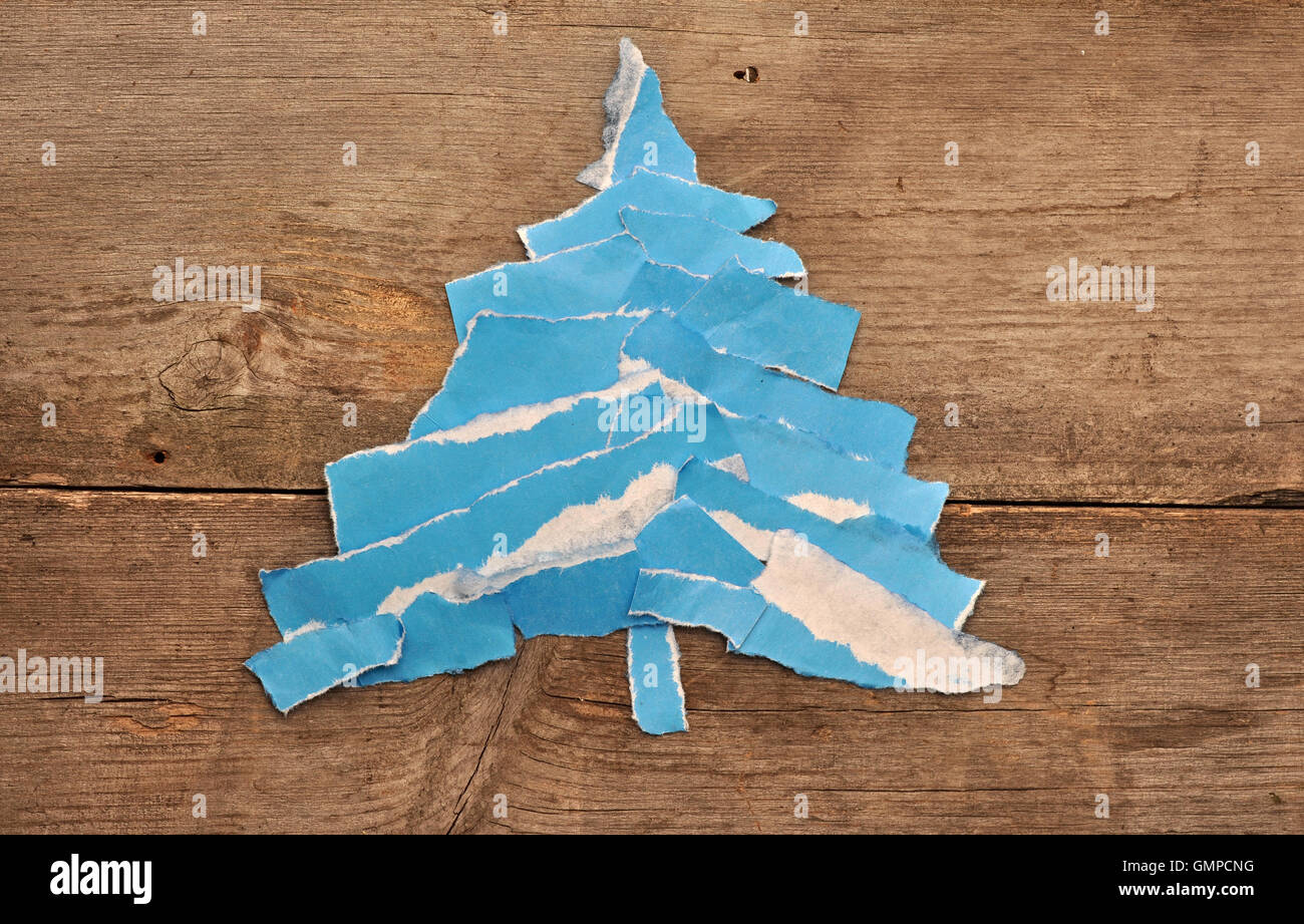 christmas tree made of blue torn paper Stock Photo - Alamy