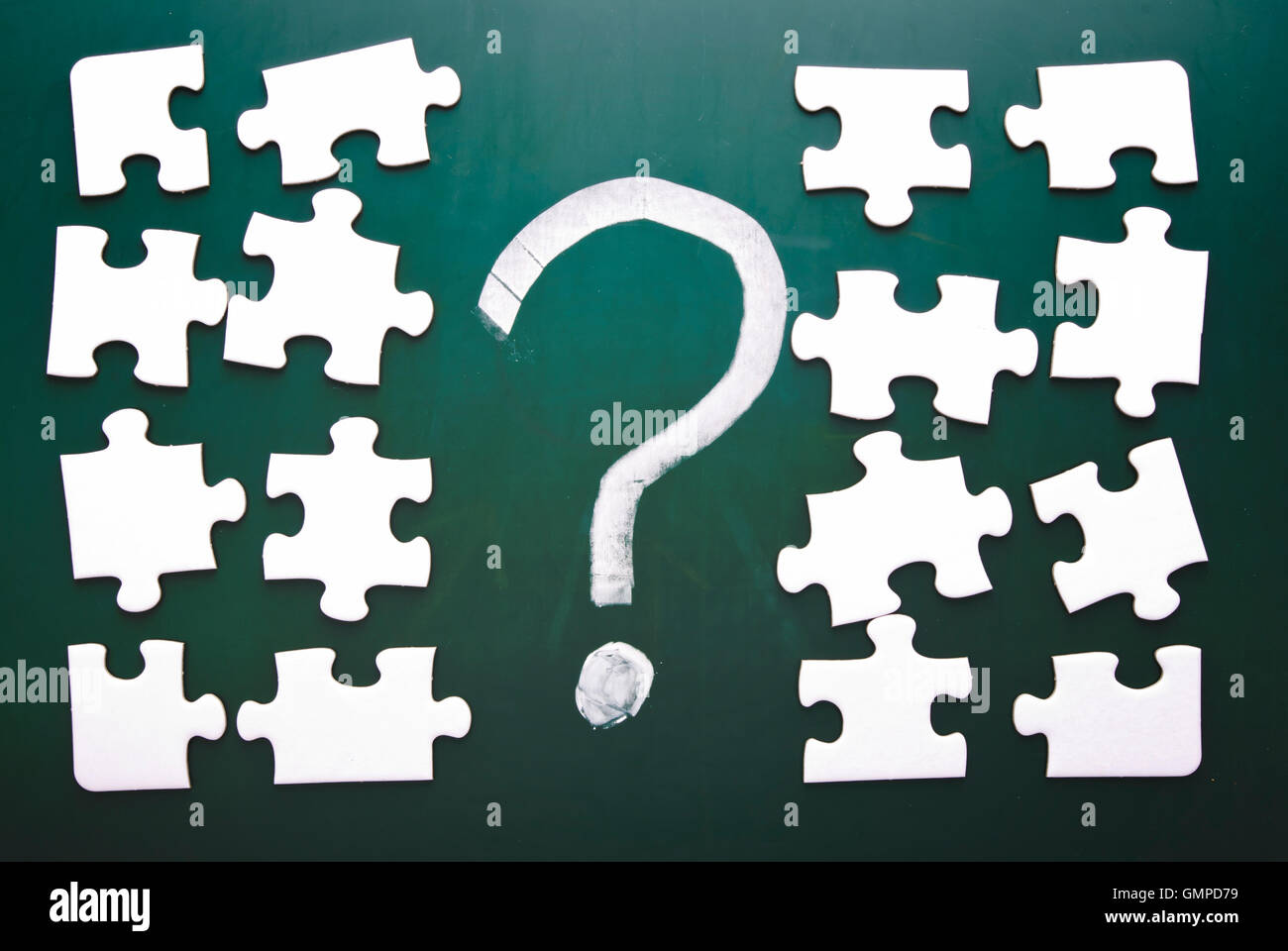 Question mark and puzzle pieces Stock Photo - Alamy