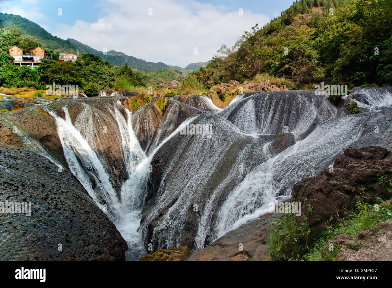 The falls shaped like pearls fall into the pit Stock Photo - Alamy