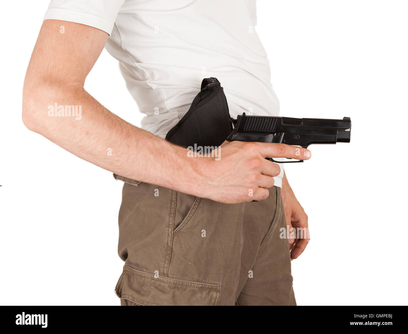 Close-up of a man with holster and a gun Stock Photo - Alamy