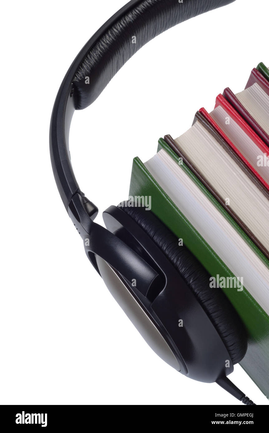 Headphones on books isolated Stock Photo - Alamy