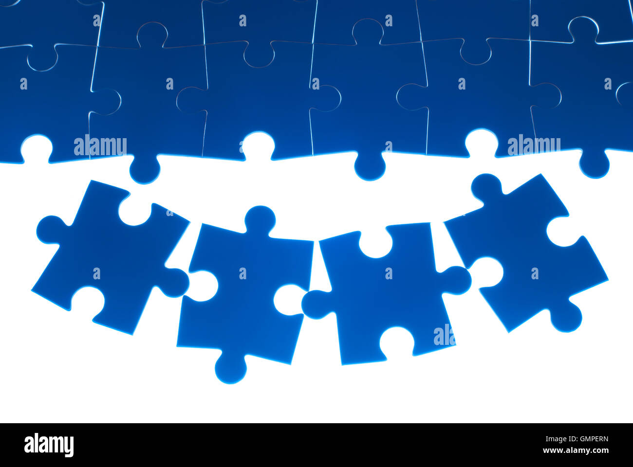 Puzzle blue isolated on white background Stock Photo - Alamy