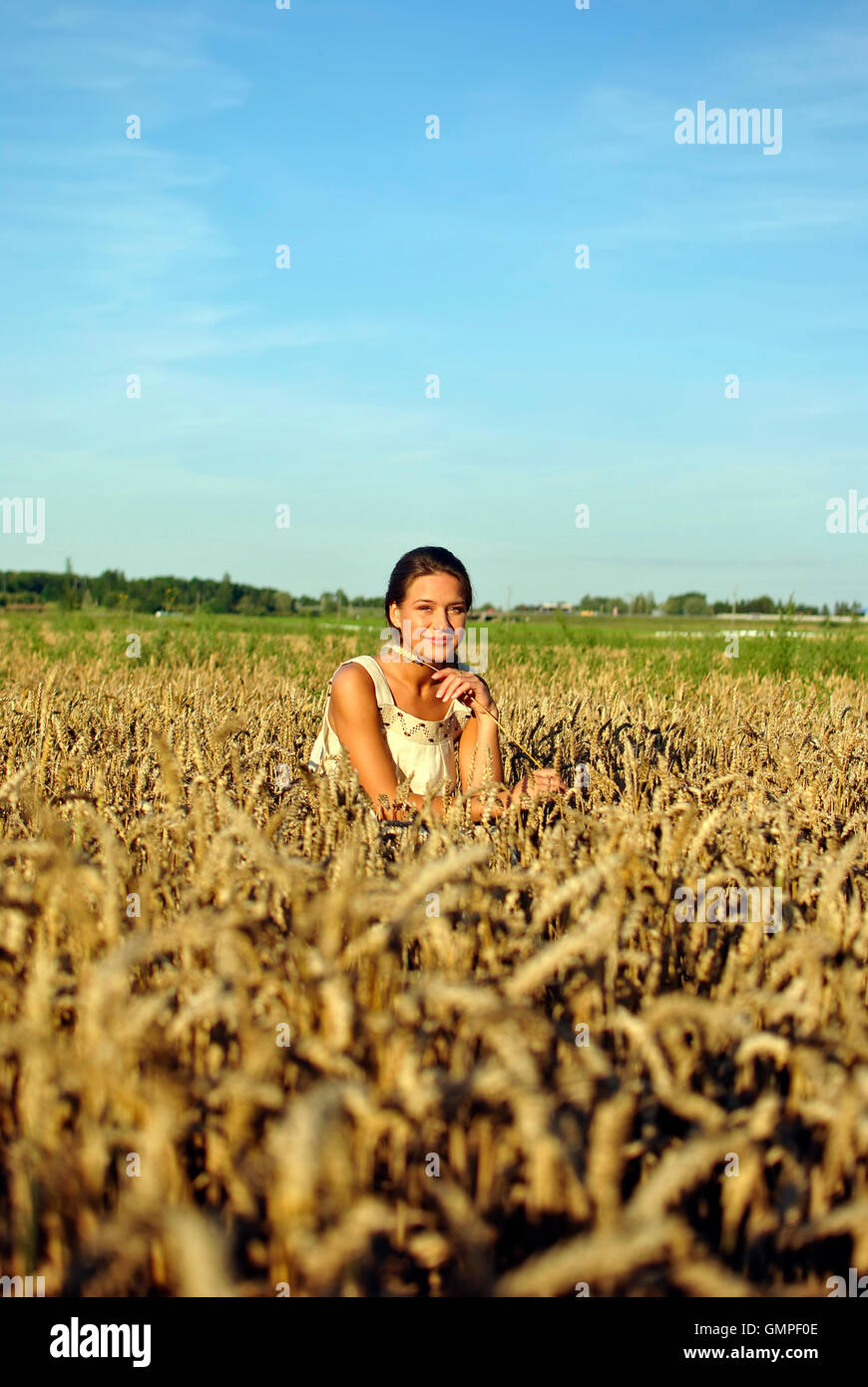 Girl in costume sitting in the Rye in the countryside Stock Photo - Alamy
