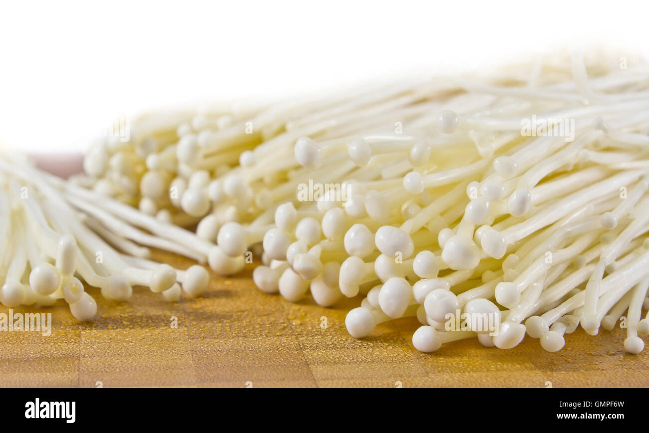 Golden needle mushroom Stock Photo - Alamy
