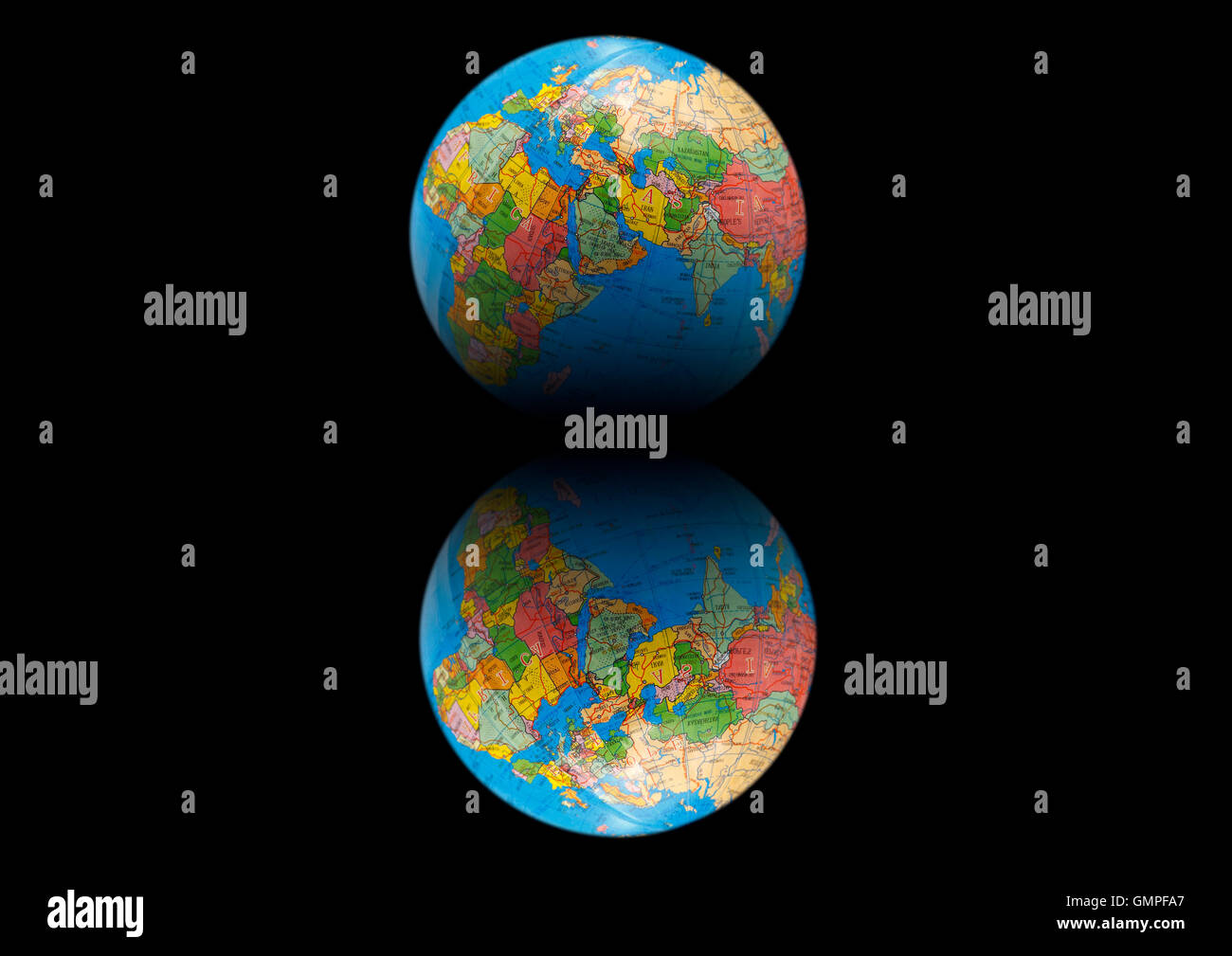 Earth on a black background with mirror Stock Photo - Alamy