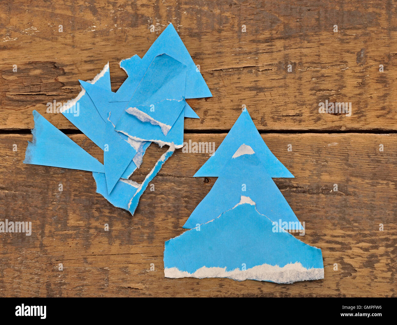 christmas tree made of blue torn paper Stock Photo - Alamy