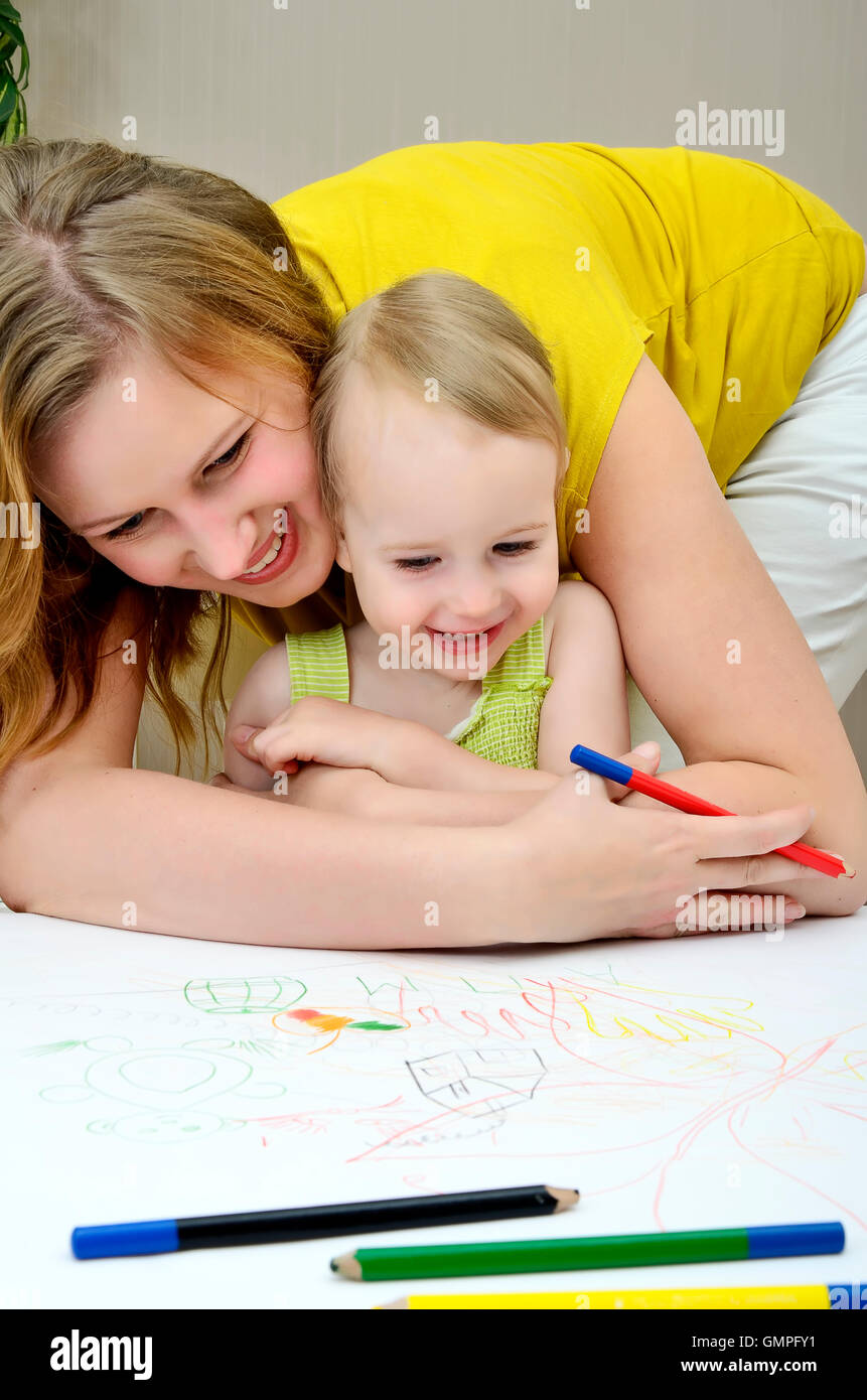 Mother and child painting Stock Photo - Alamy