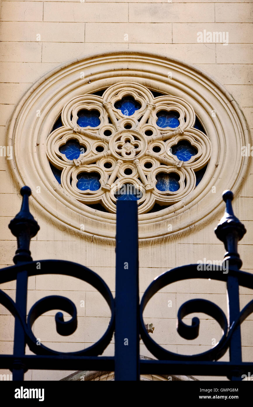 colored rose window and a iron grate Stock Photo - Alamy