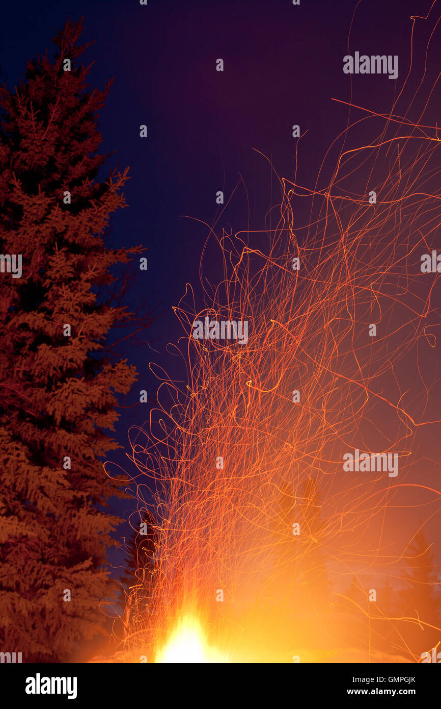 Forest fire danger hot spark trails from campfire Stock Photo - Alamy