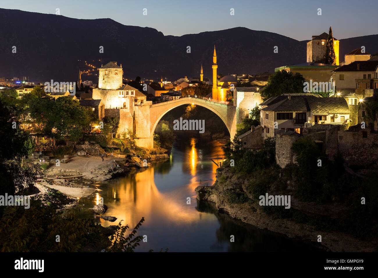 A view of the Mostar skyline at night towards the Old Bridge (Stari ...