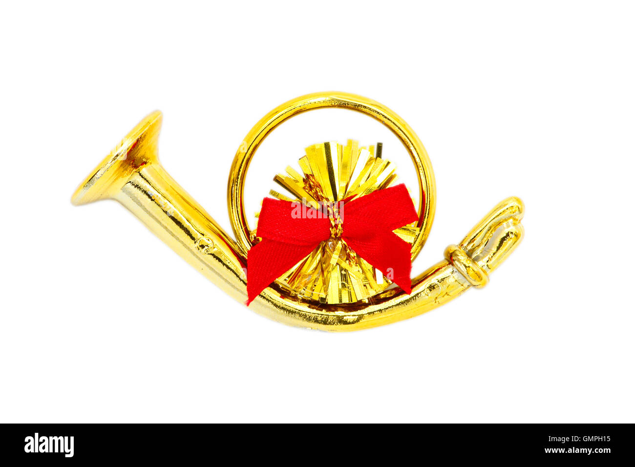 Golden christmas trumpet and red ribbon on a white background Stock ...
