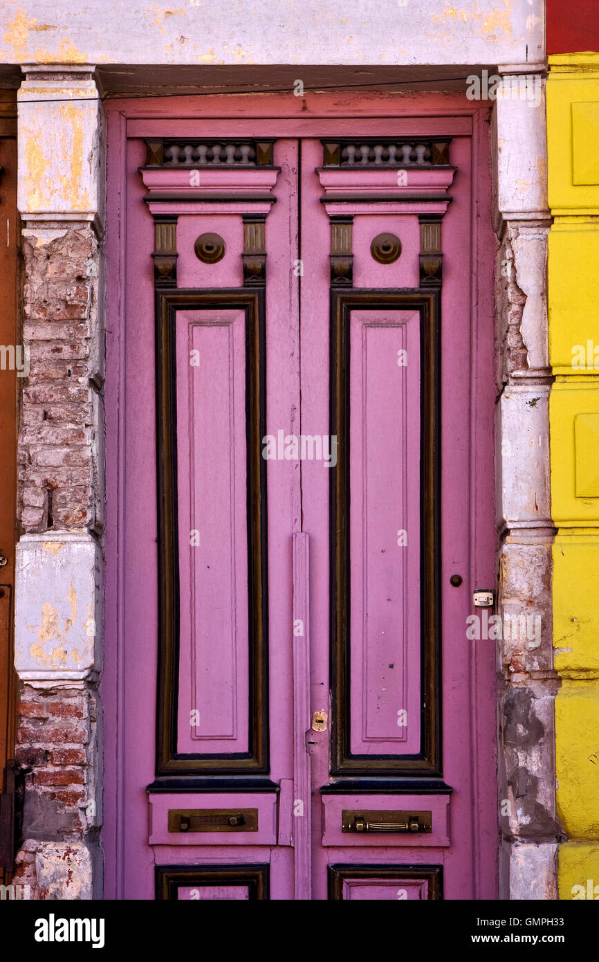 black violet wood old door in the centre of la boca Stock Photo - Alamy