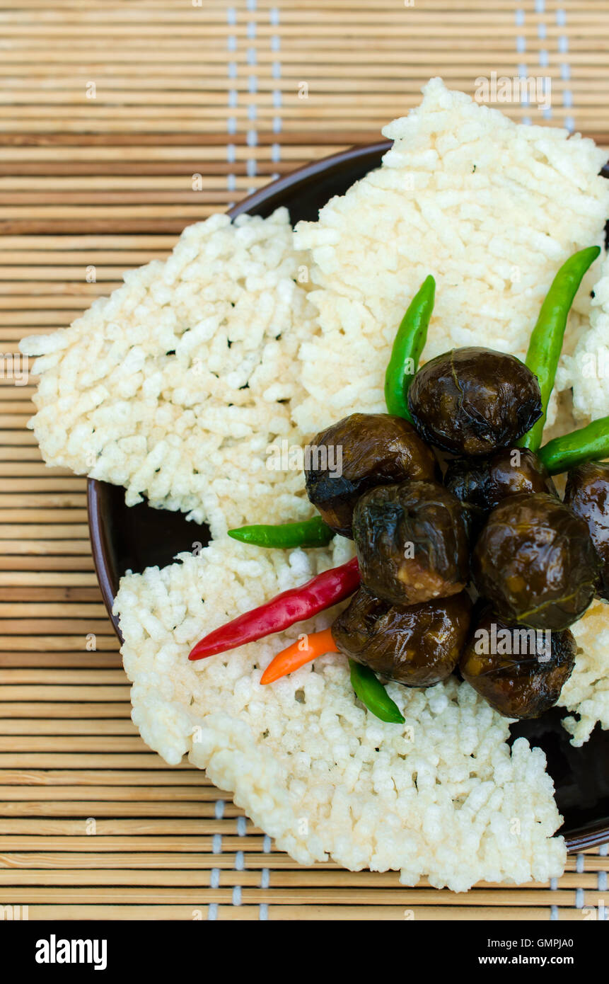 Miang Lao rice cracker Stock Photo - Alamy