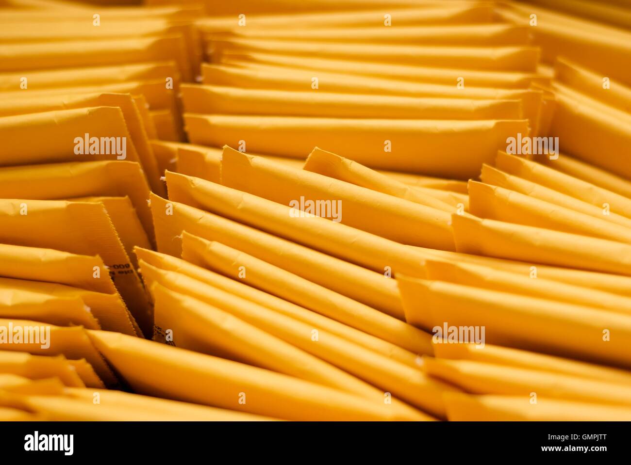 Pile of Padded Shipping Envelopes Stock Photo - Alamy