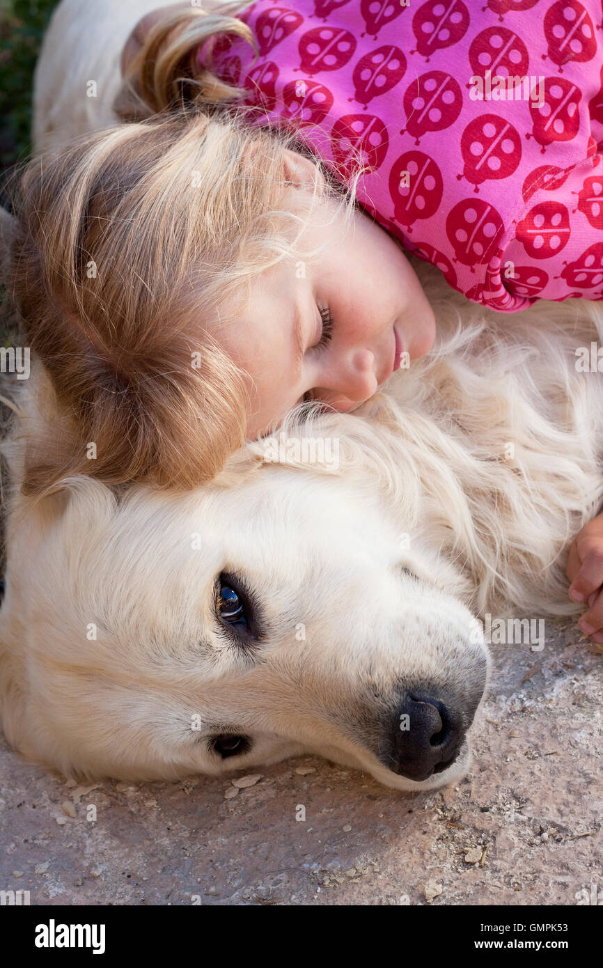 Little girl with dog Stock Photo - Alamy