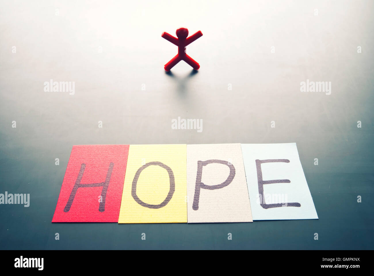Colorful hope word and single person Stock Photo - Alamy