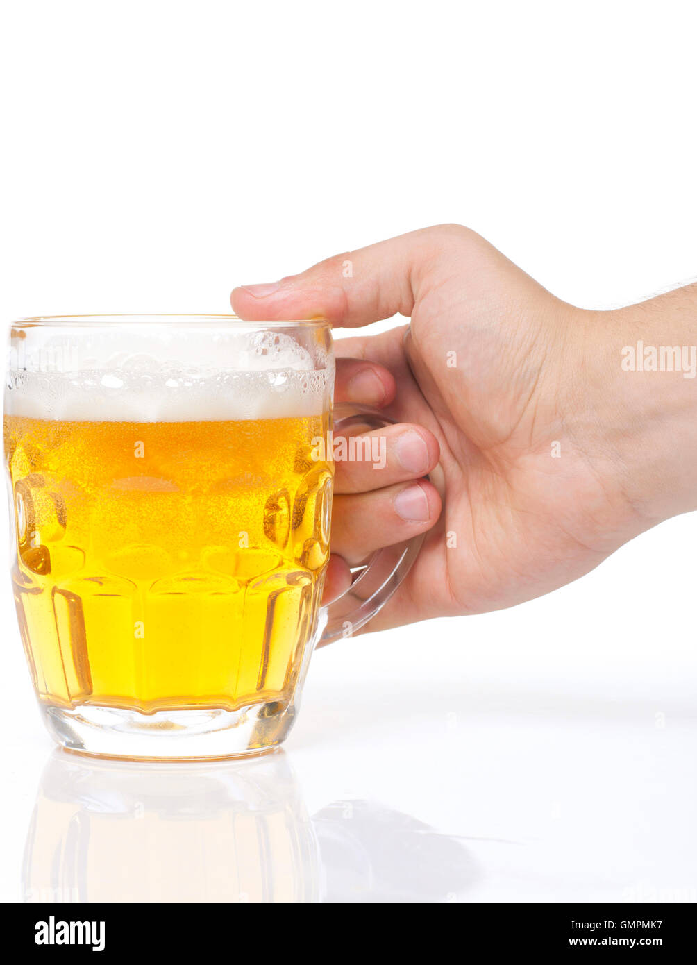 Hand holding cold lager beer Stock Photo - Alamy