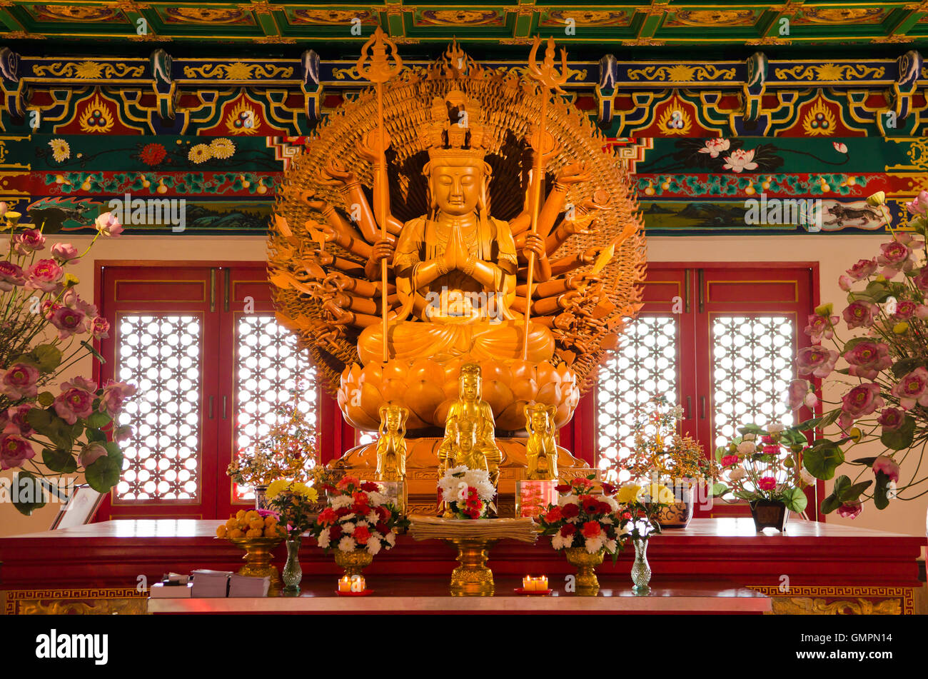 Golden Wood Statue of Chinese people Stock Photo - Alamy