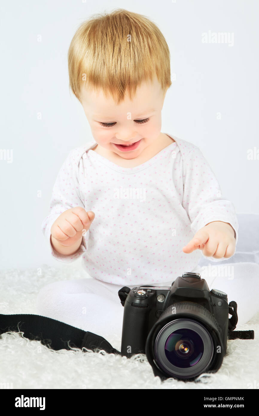 Beautiful Baby With Camera Stock Photo - Alamy