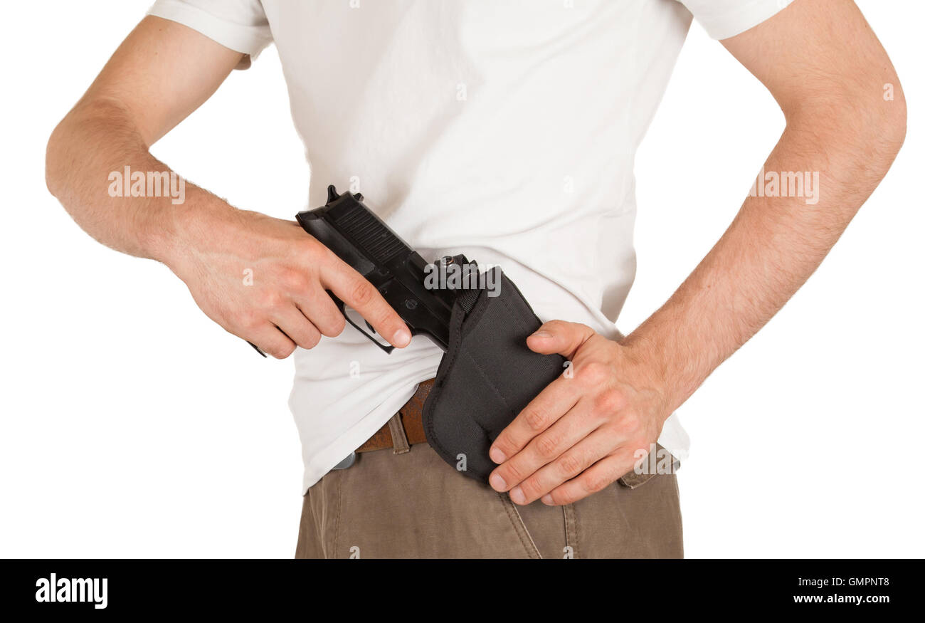 Close-up of a man with holster and a gun Stock Photo - Alamy