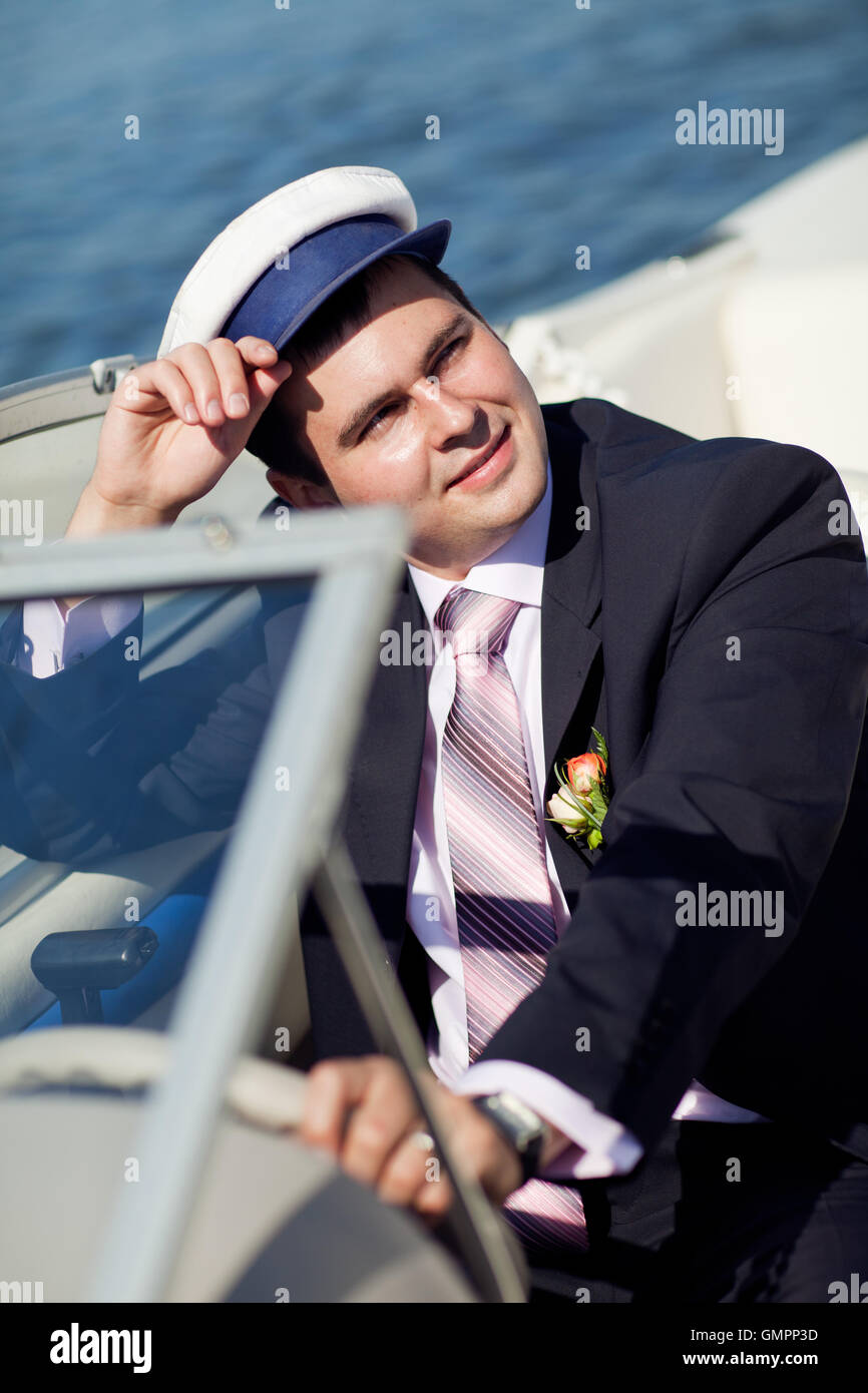 Captain managing the yacht Stock Photo - Alamy