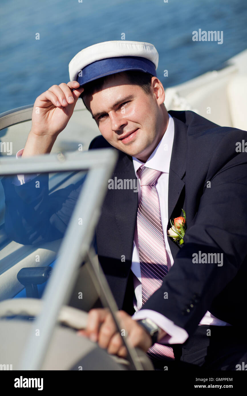 Captain managing the yacht Stock Photo - Alamy