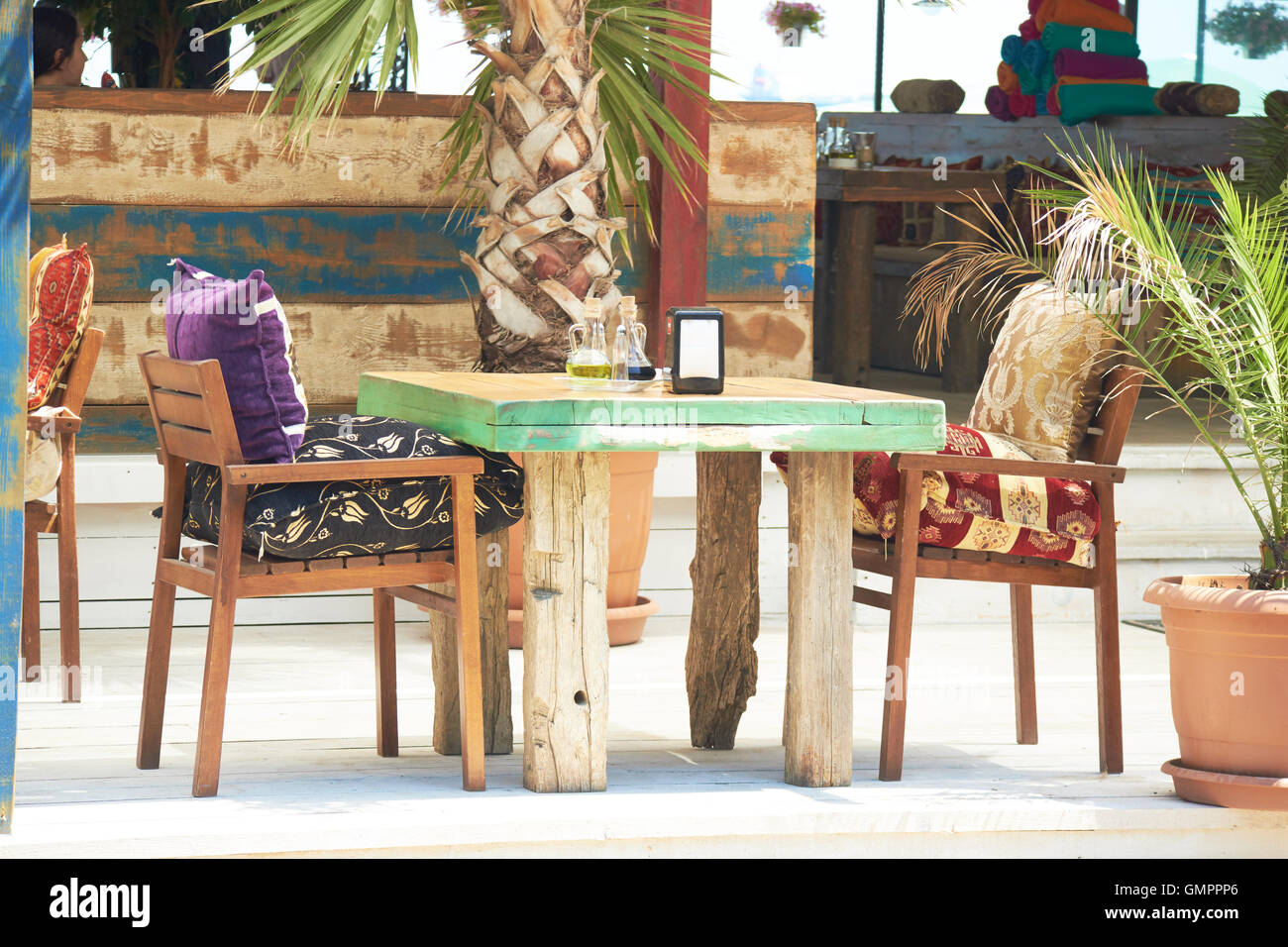 tables at an outdoor cafe Stock Photo - Alamy