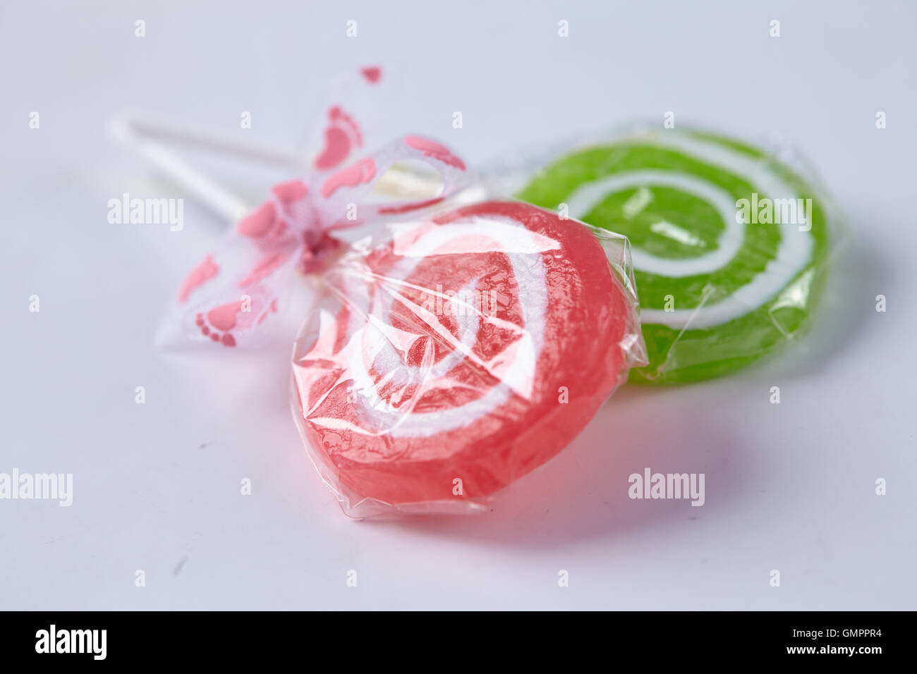 candy on a stick on a white background Stock Photo - Alamy