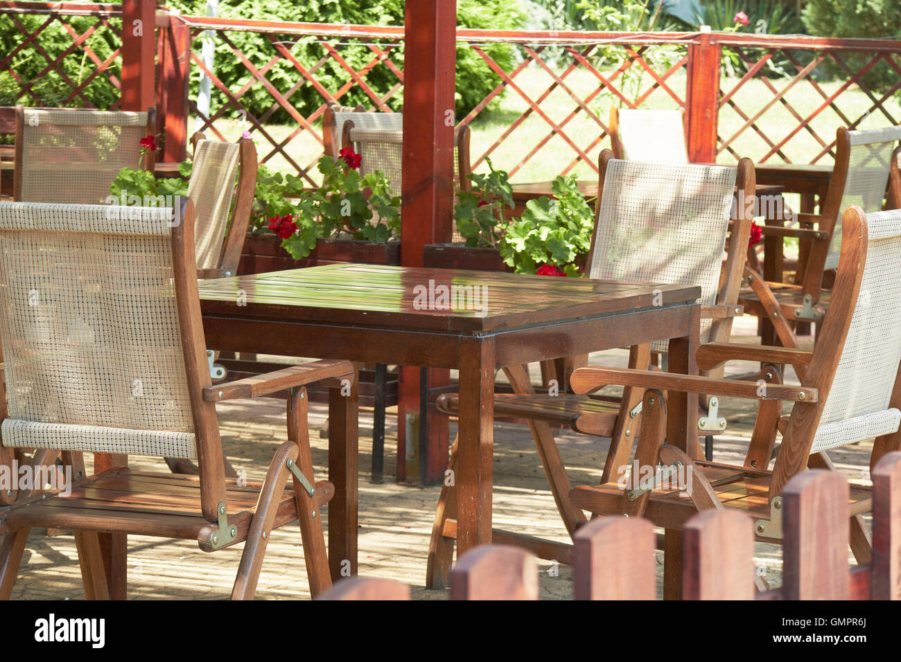 tables at an outdoor cafe Stock Photo - Alamy