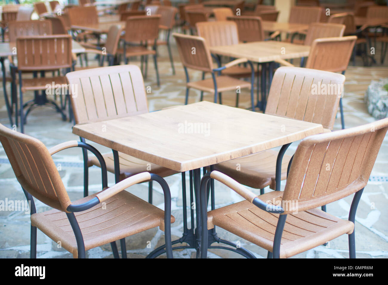 tables at an outdoor cafe Stock Photo - Alamy