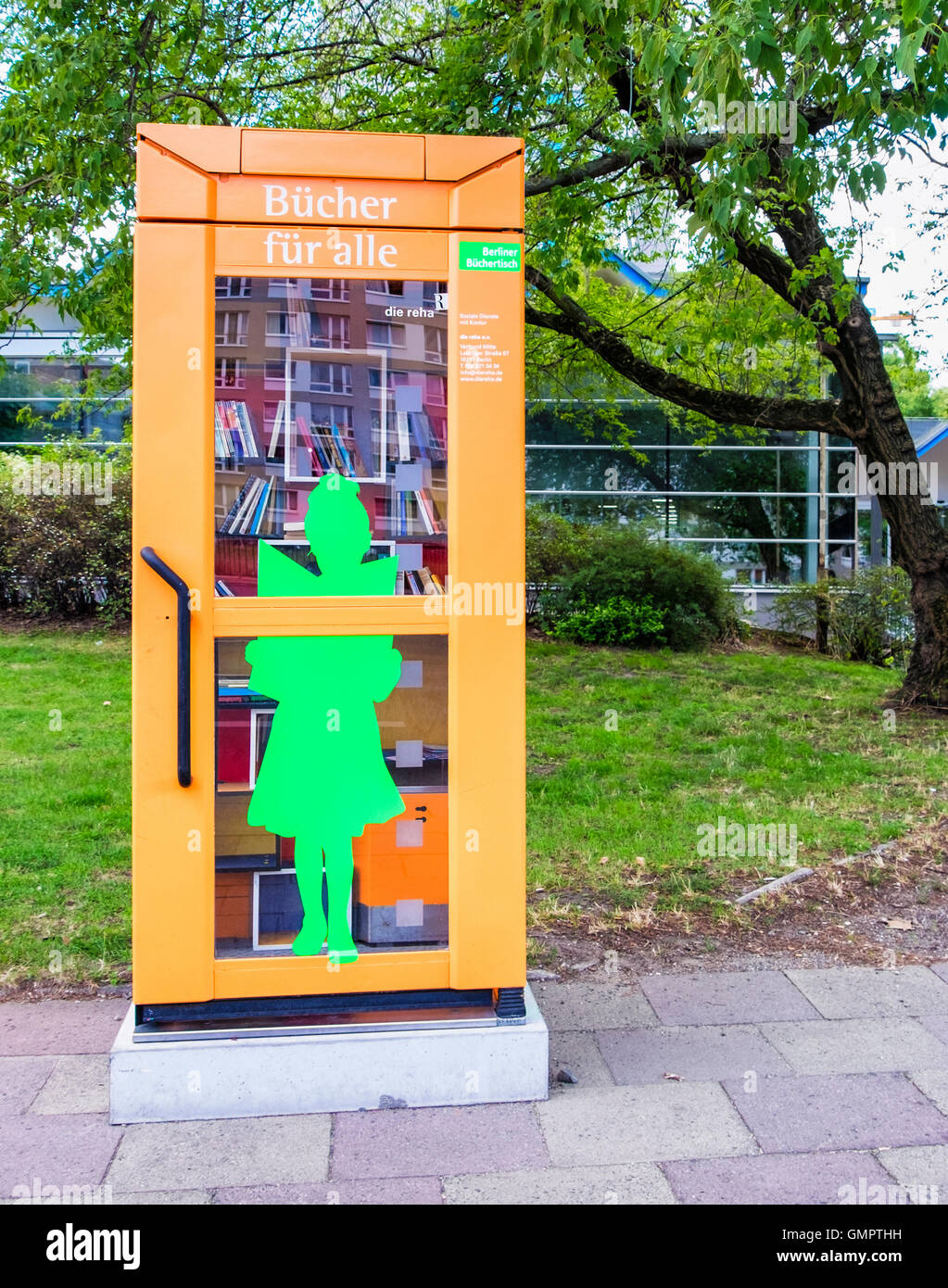 Library in a telephone box. Phone booth houses smallest library in ...