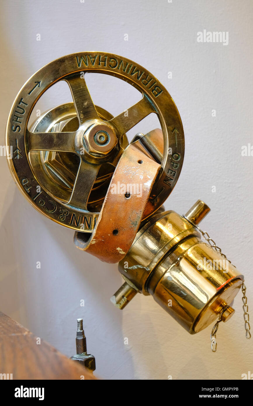 A brass tap and hose connector for an internal fire defense with a ...