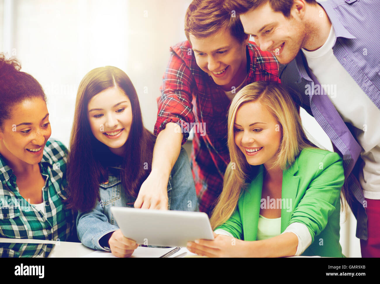 students looking at tablet pc in lecture at school Stock Photo - Alamy